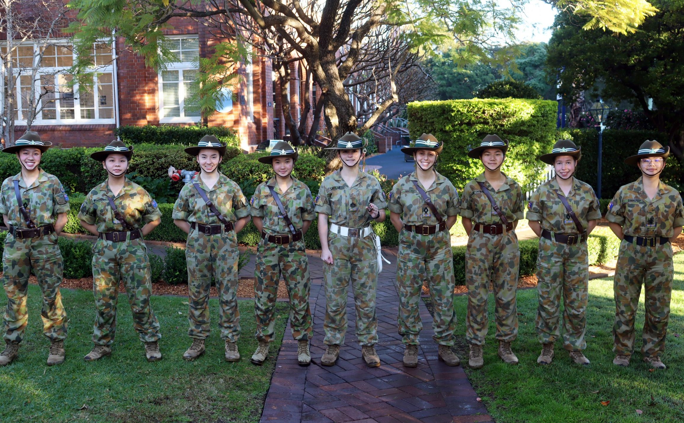 2021_Cadets_Nine female cadets in uniform standing outside | Meriden